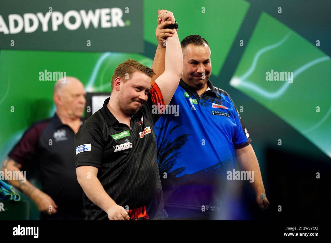 Martin Schindler celebrates after beating Jermaine Wattimena (right) on ...