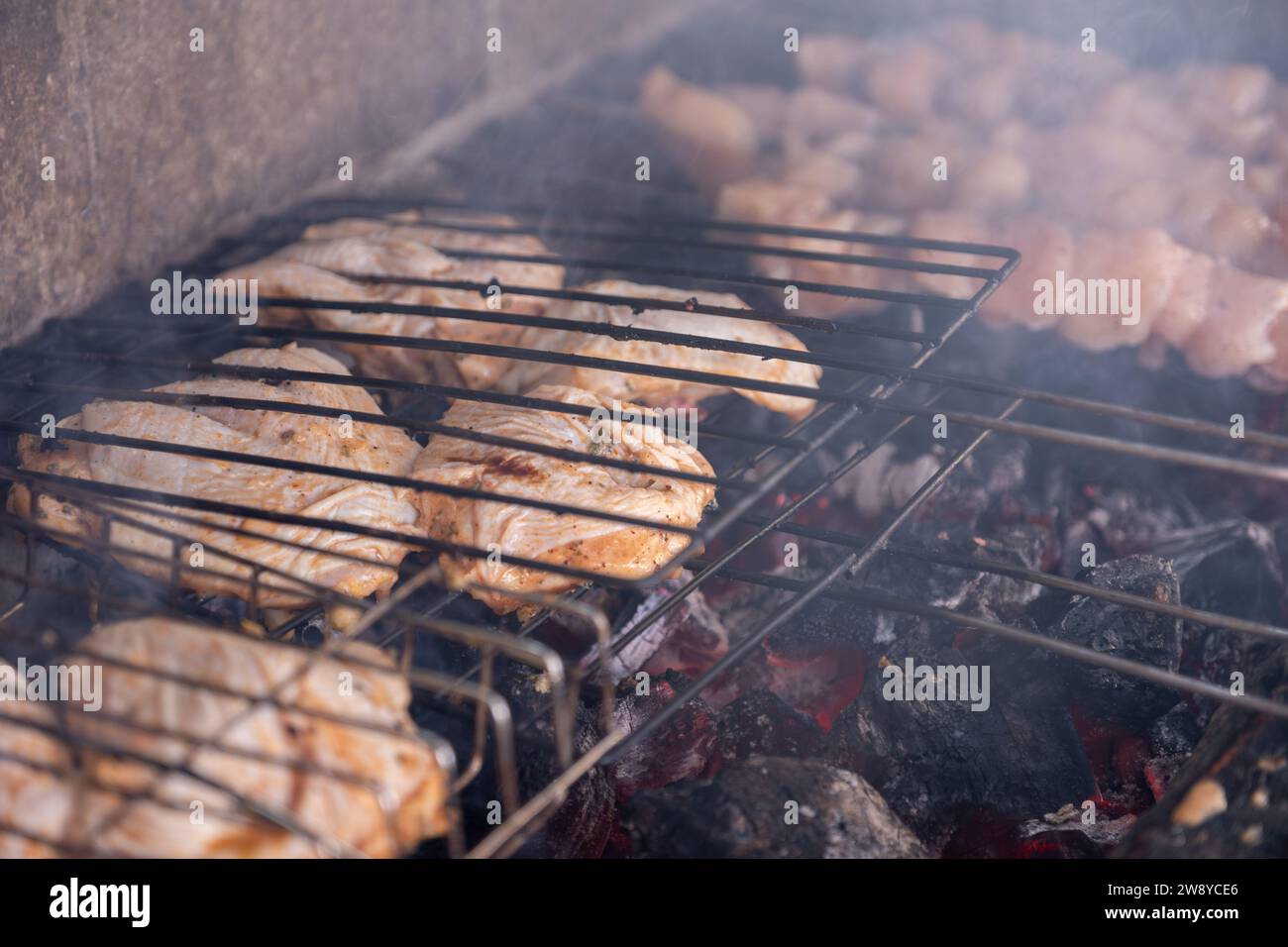 Grill chicken on barbecue stove hi-res stock photography and images - Alamy