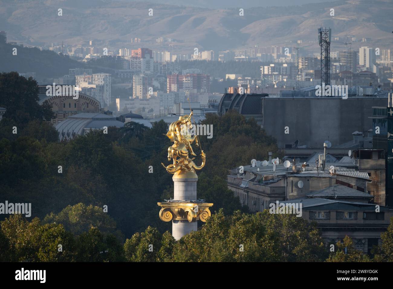 22 October 2023, Georgia, Tiflis: The golden sculpture with the statue ...