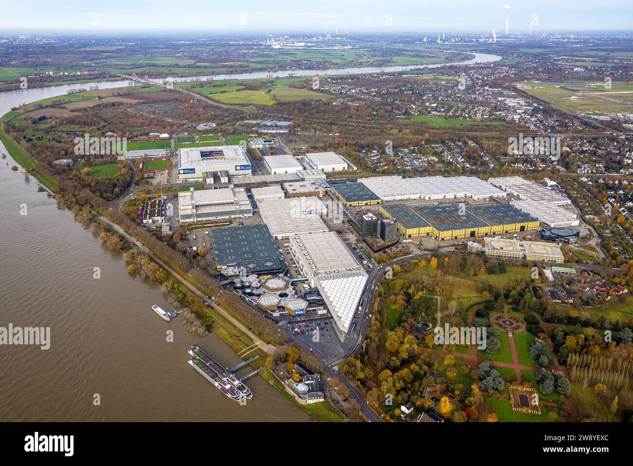 Aerial view, grounds and halls of Messe Düsseldorf on the river Rhine ...