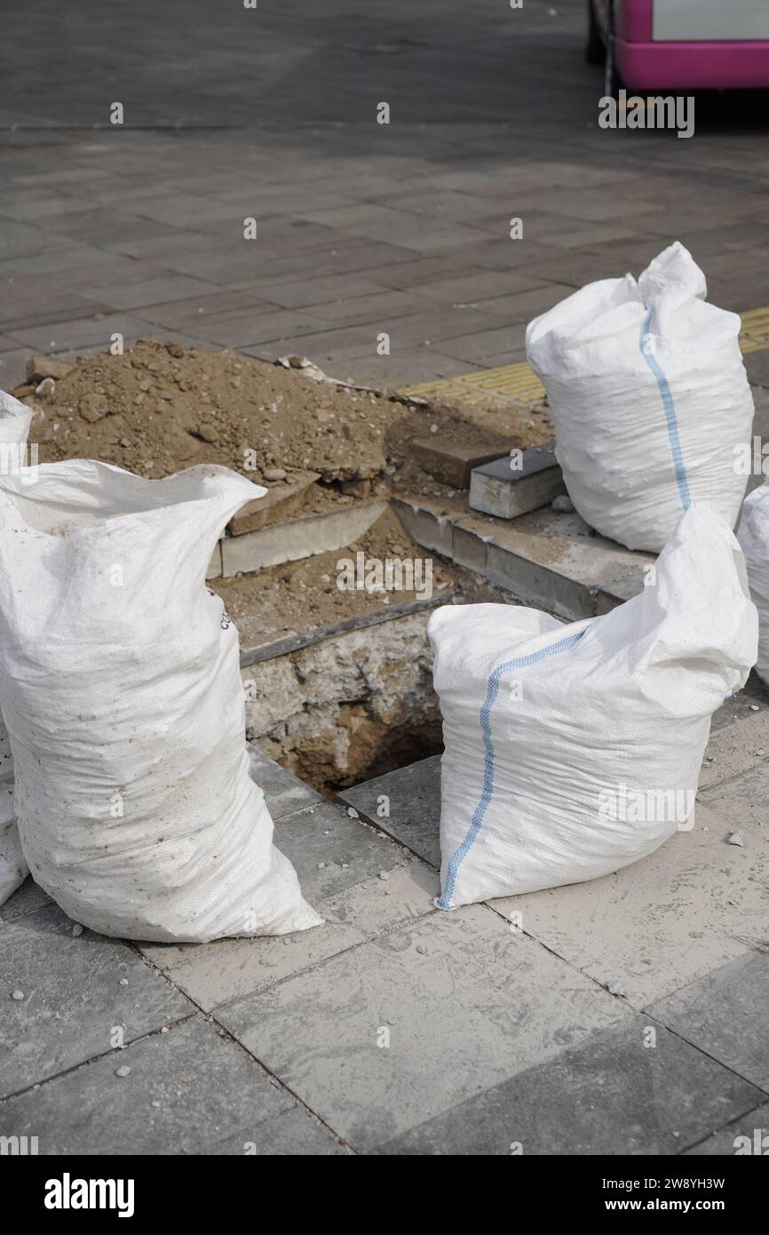 repair of water channels, and soil in sacks Stock Photo - Alamy