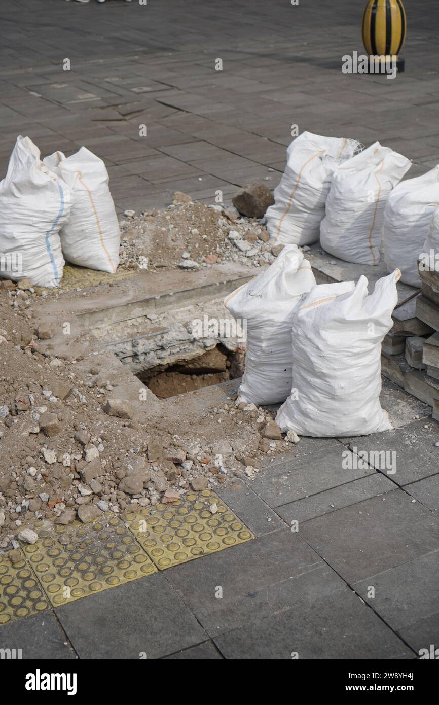 repair of water channels, and soil in sacks Stock Photo - Alamy