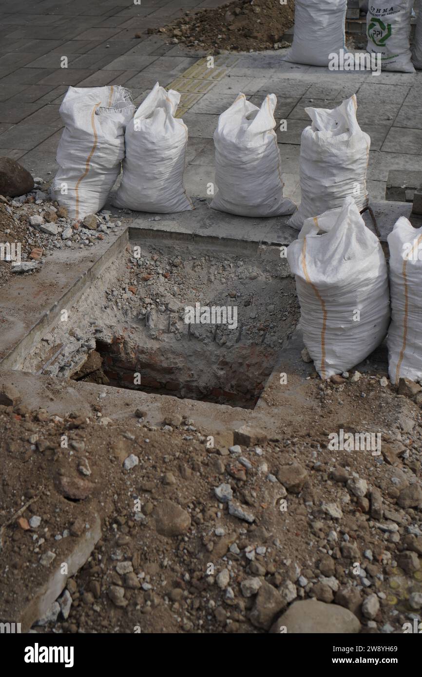 repair of water channels, and soil in sacks Stock Photo - Alamy