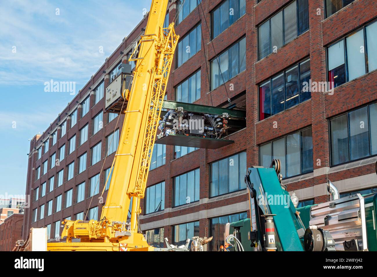 Detroit, Michigan - A large printer is lifted through the third floor ...