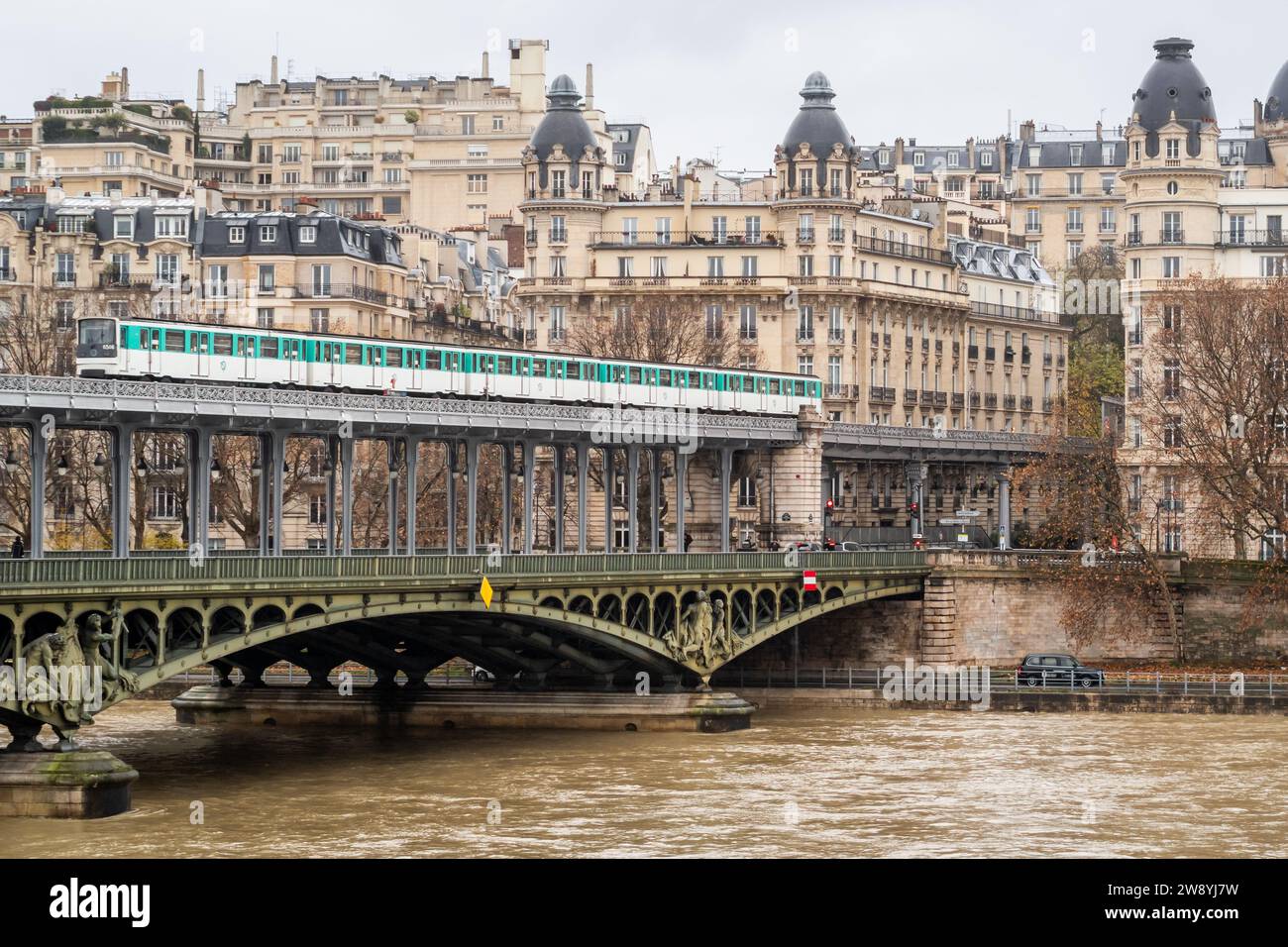 Old Metro line 6 on the Passy viaduct of the Bir Hakeim bridge in Paris ...