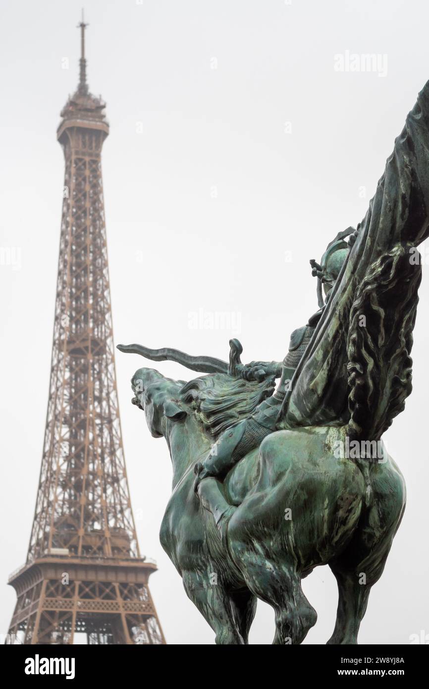 Statue of resurgent France pointing towards the Eiffel Tower from the ...