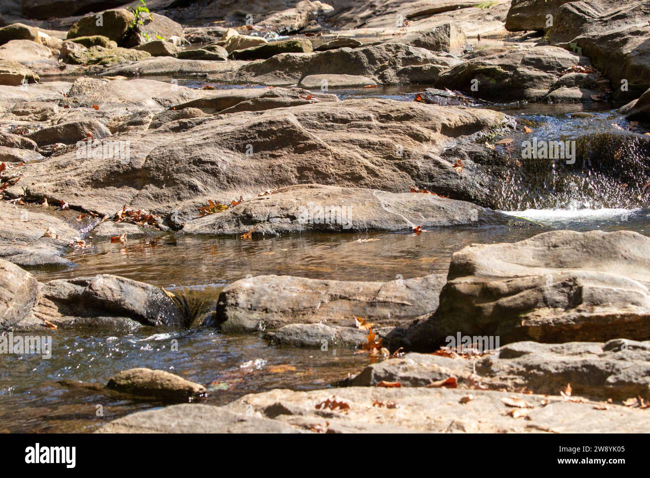 Water moving through rocks hi-res stock photography and images - Alamy