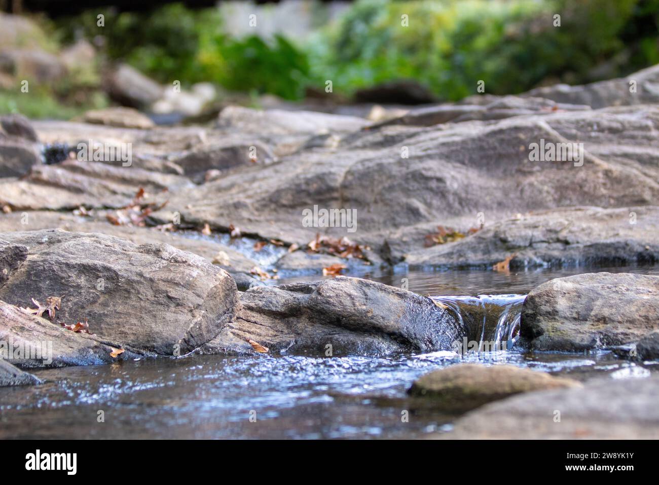 Water moving through rocks hi-res stock photography and images - Alamy