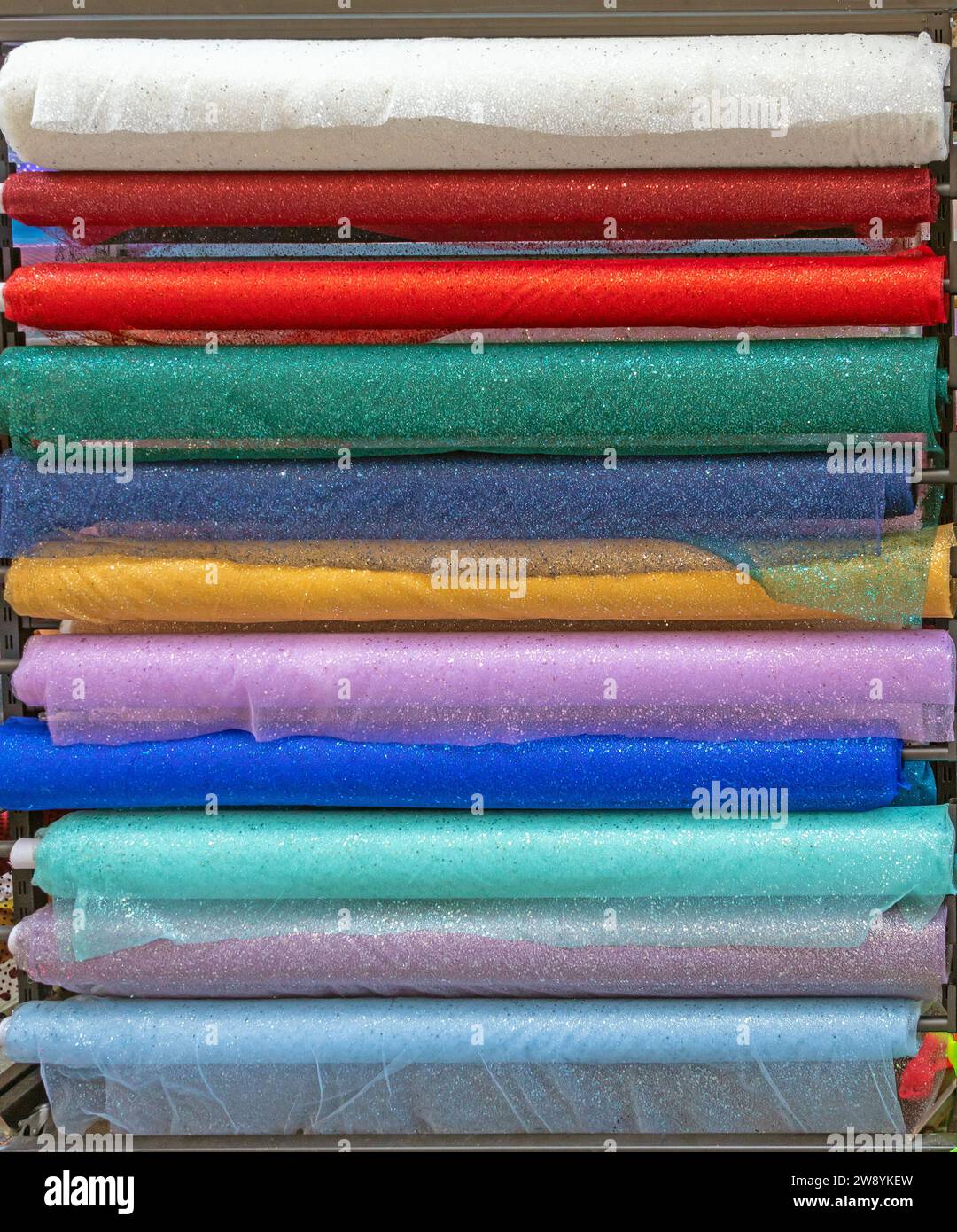 Colorful shimmer fashion materials pattern background sold on a market ...