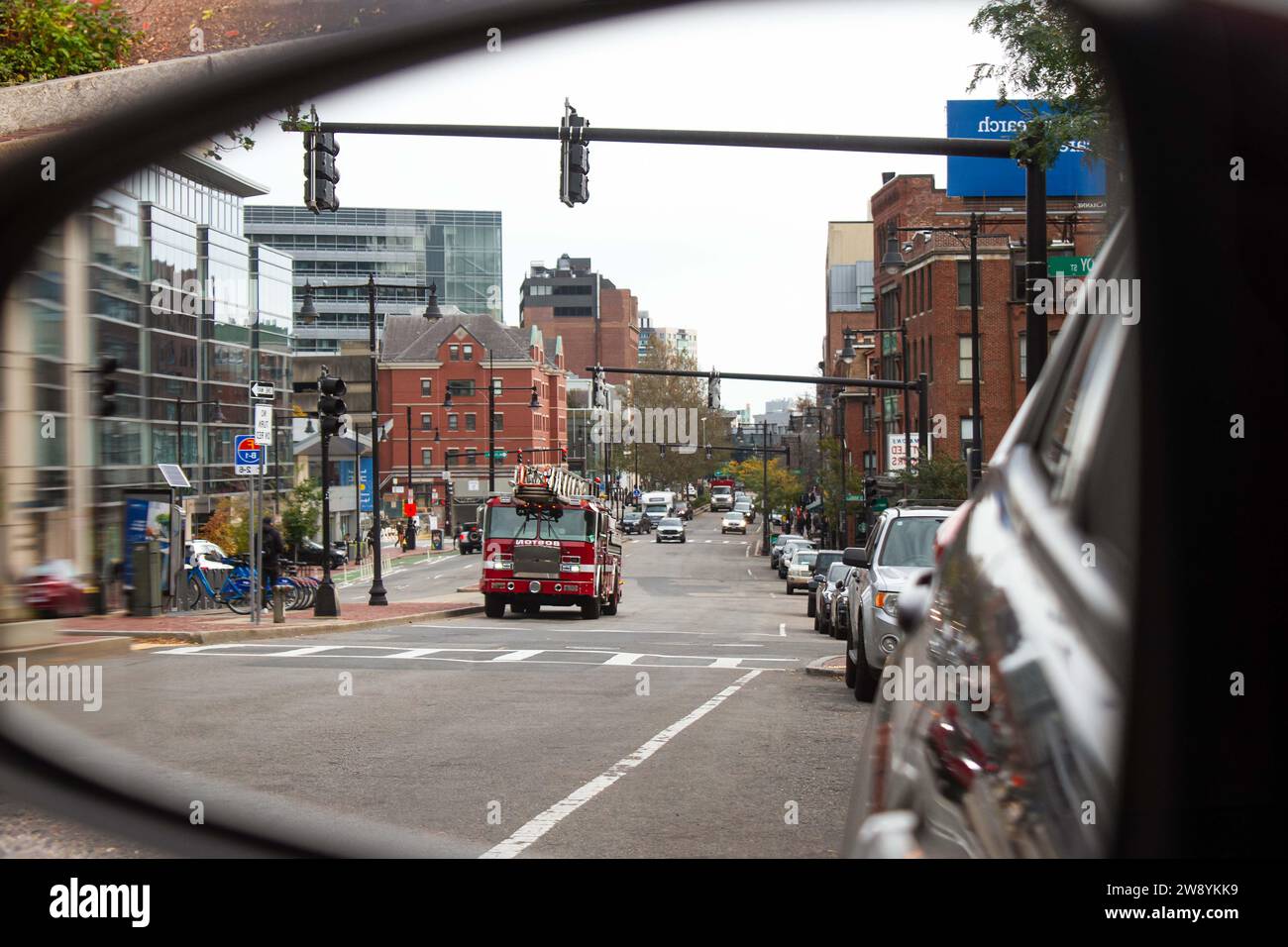 Boston, MA USA - November 4 2023: Side car mirror view of Boston street ...
