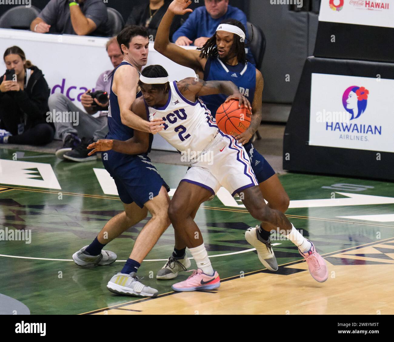 Honolulu, Hawaii, USA. 22nd Dec, 2023. TCU forward Emanuel Miller (2 ...
