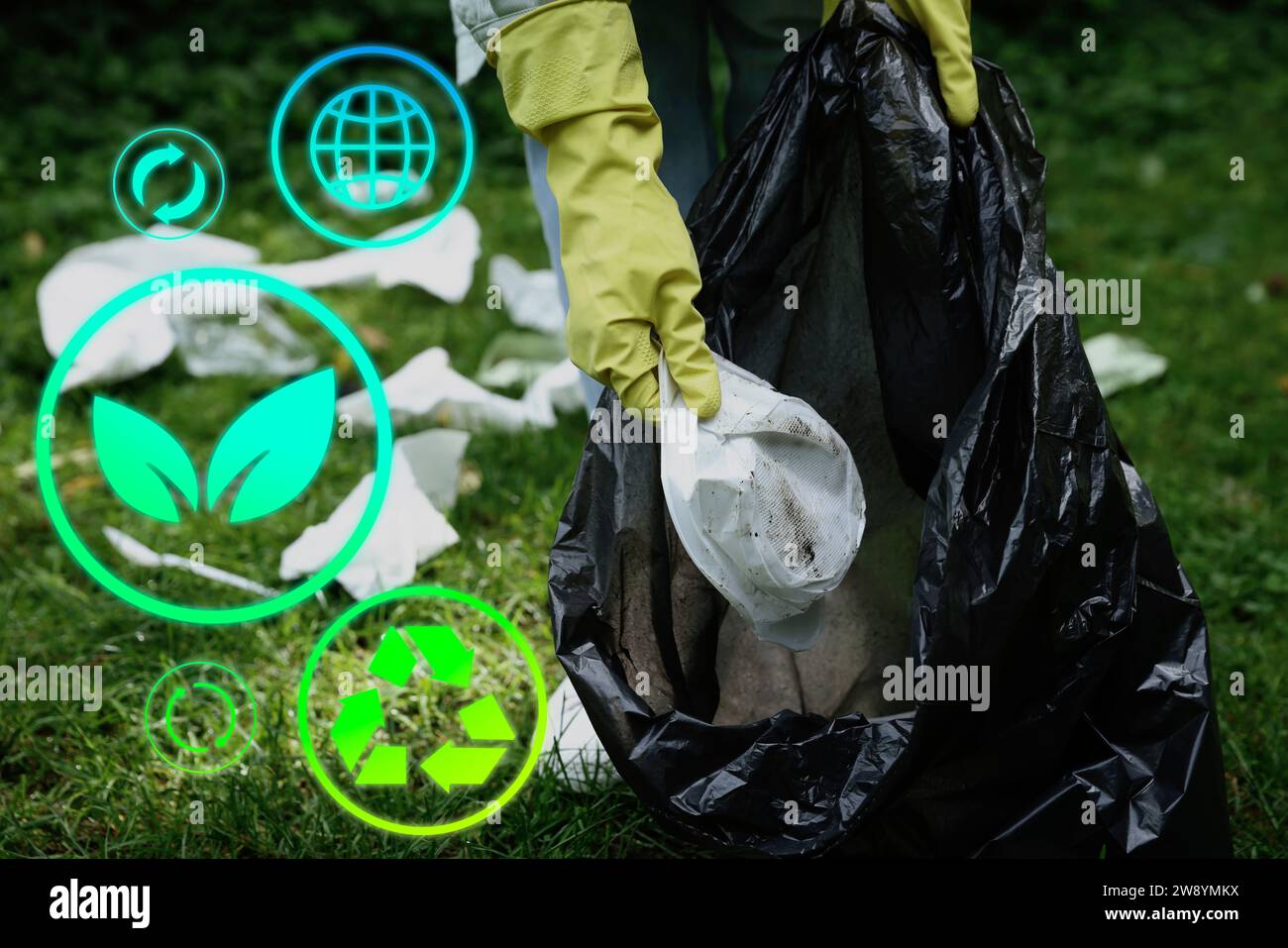 Woman with trash bag picking up garbage in nature, closeup. Recycling ...
