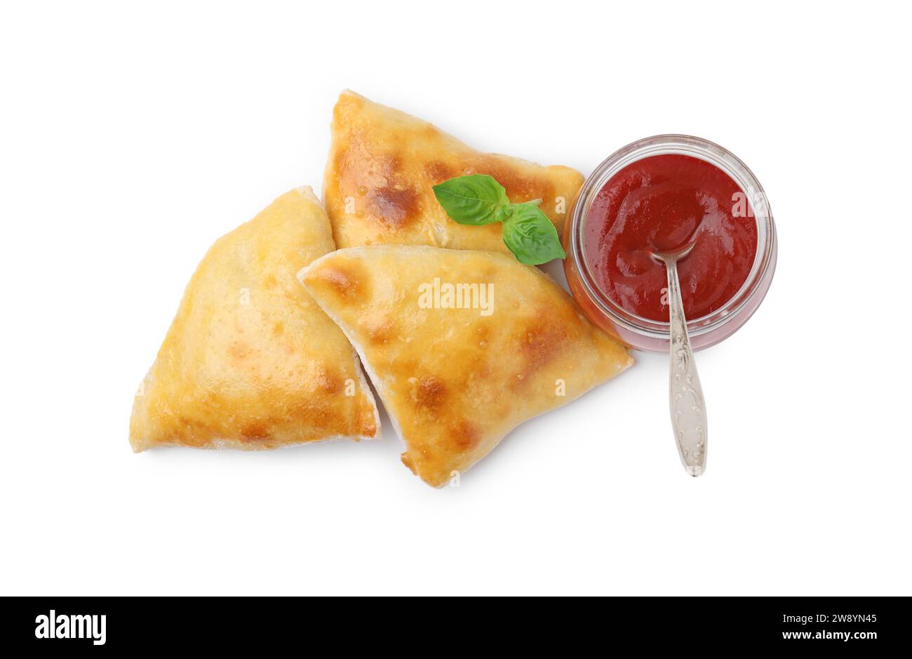 Delicious samosas, basil and tomato sauce isolated on white, top view ...