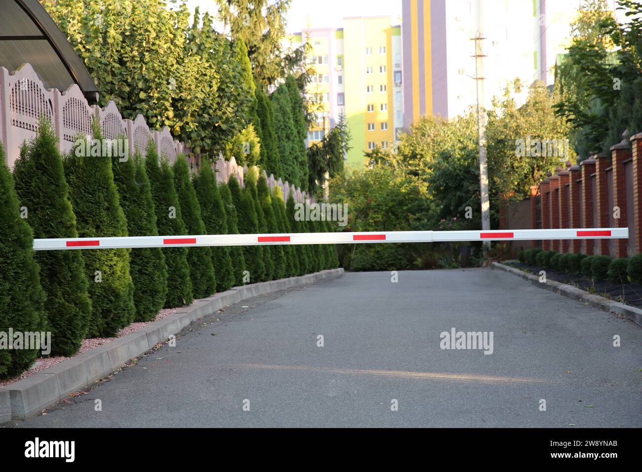 Closed automatic boom barrier on city street Stock Photo - Alamy