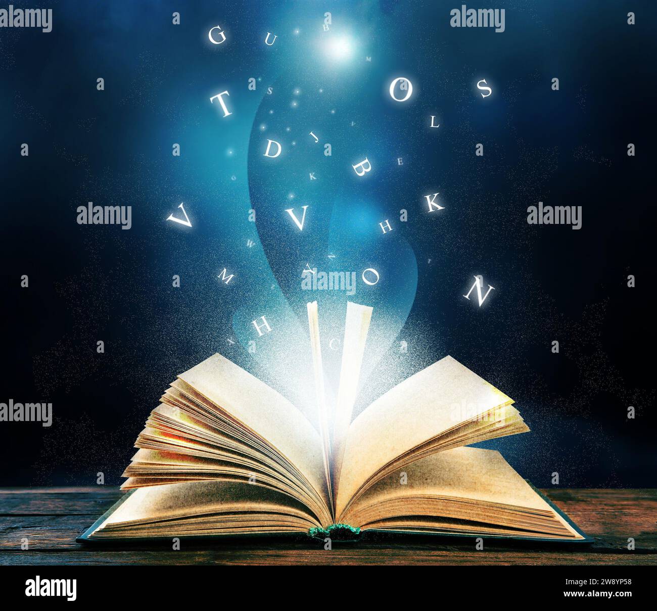 Open book with magic light and glowing letters flying out of it on ...