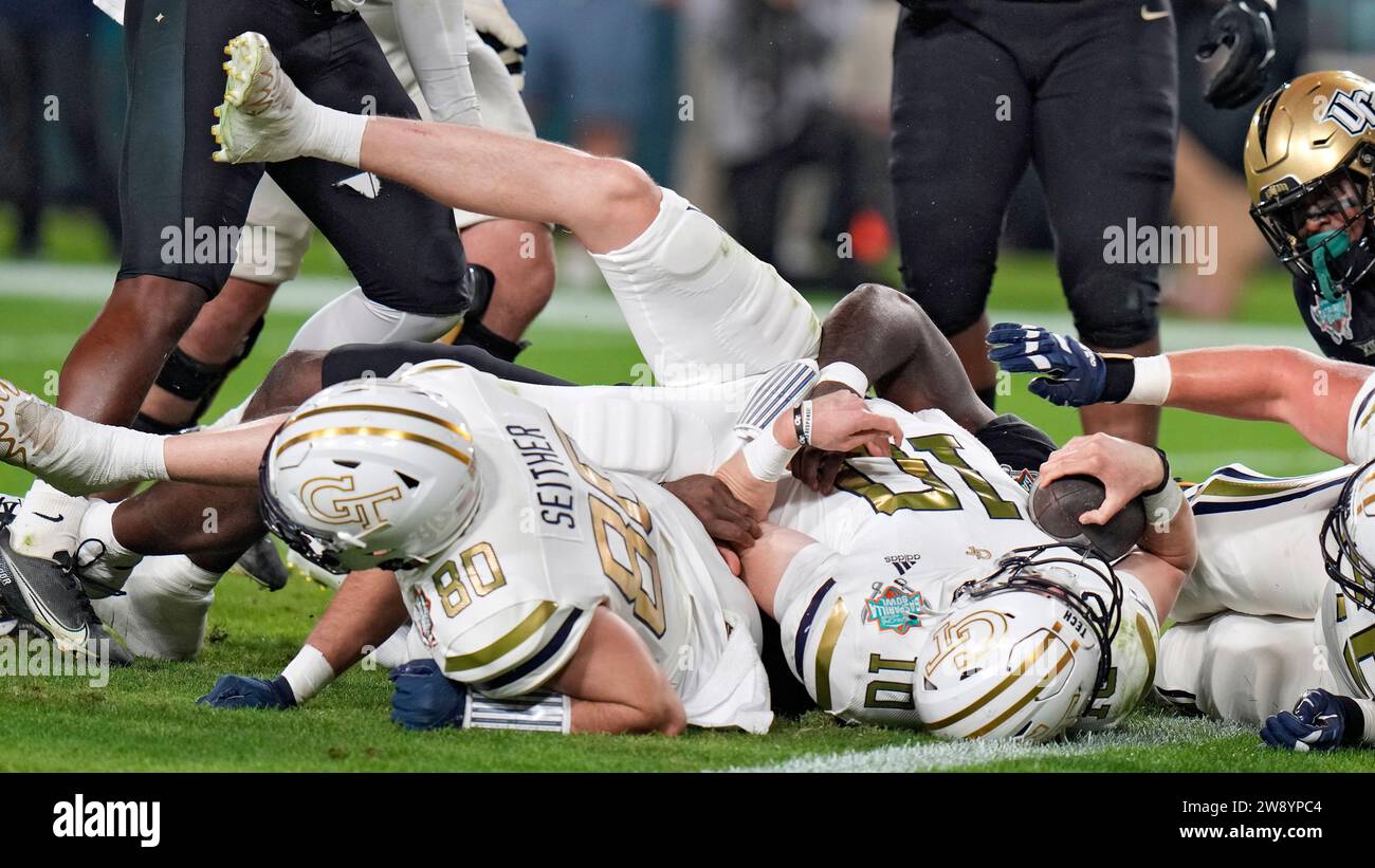 Georgia Tech quarterback Haynes King (10) scores on a 5-yard touchdown ...