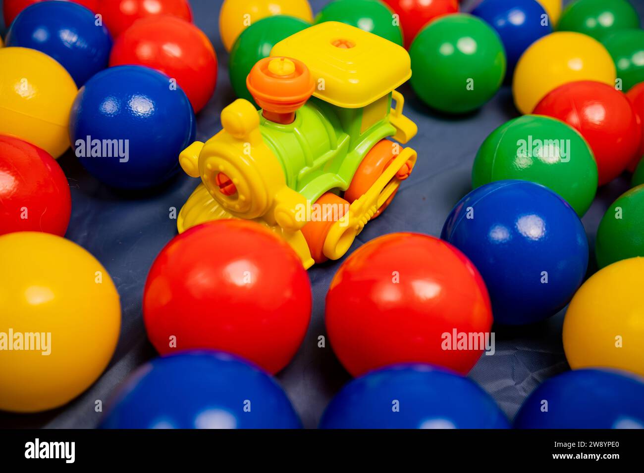 Toy train for kids with colored balls. Bright children's toys Stock ...
