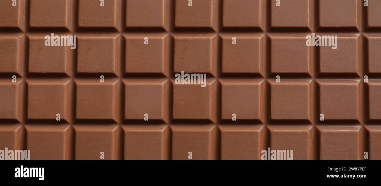Delicious milk chocolate bar as background, closeup. Banner design ...
