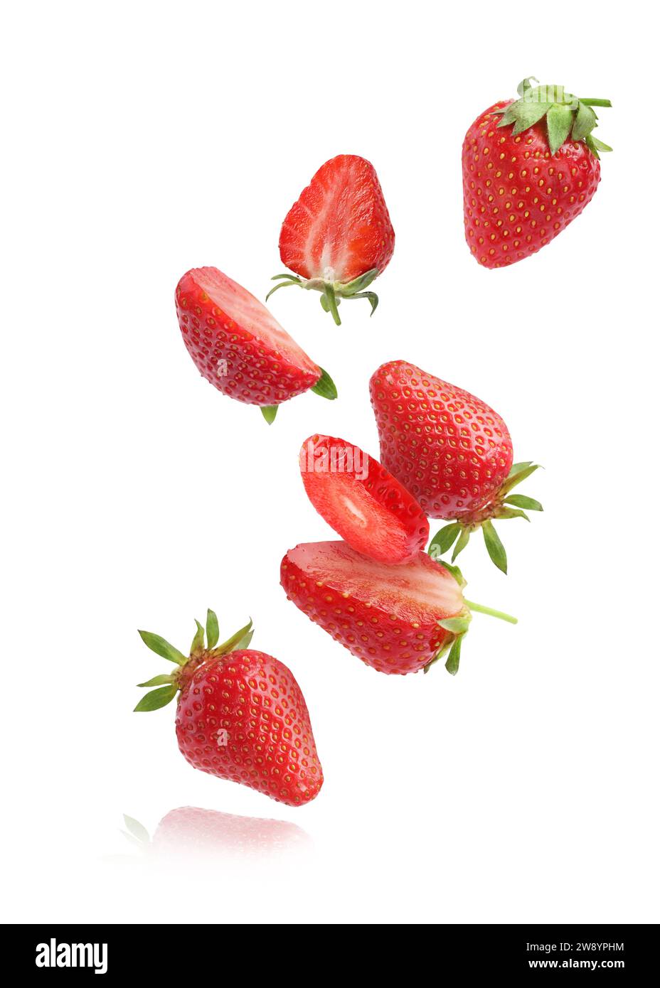 Fresh ripe strawberries falling on white background Stock Photo - Alamy