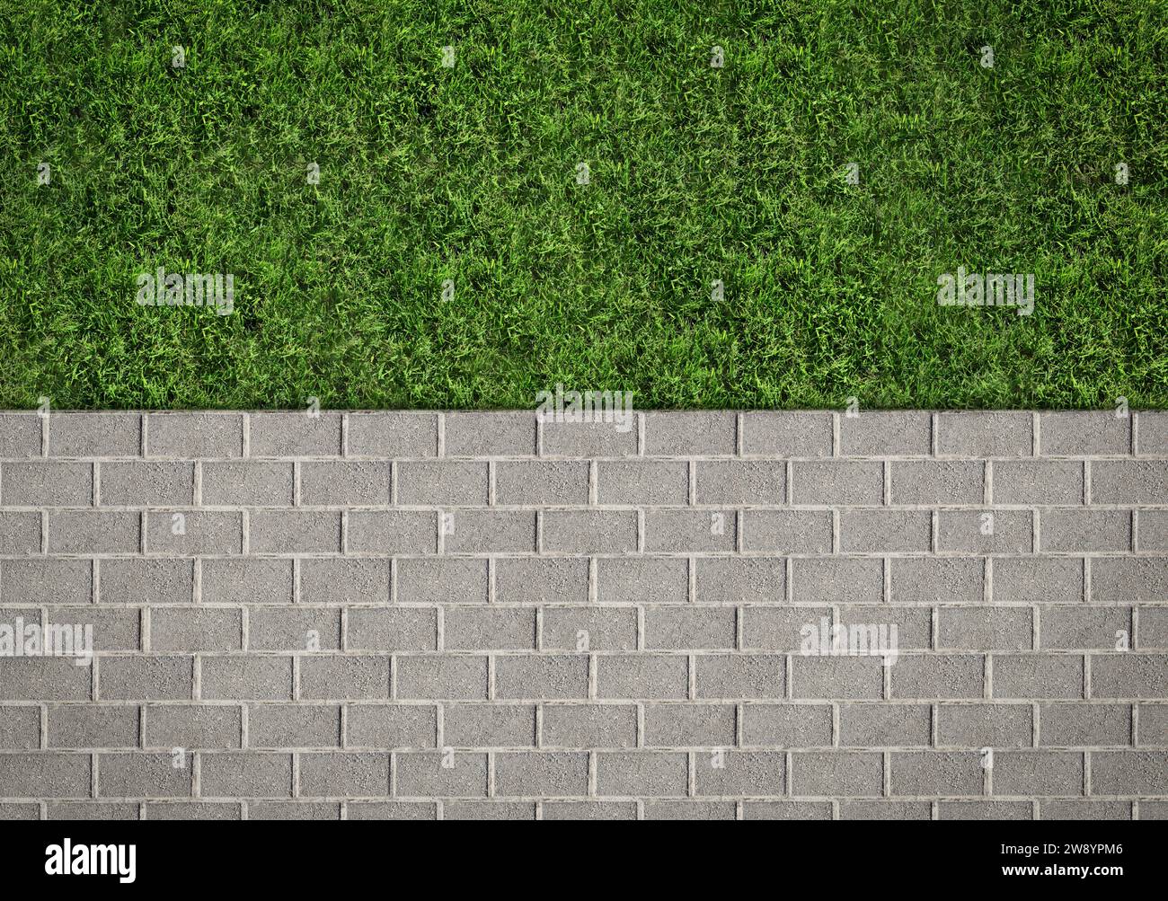 Fresh green grass and grey tiles outdoors, top view Stock Photo - Alamy