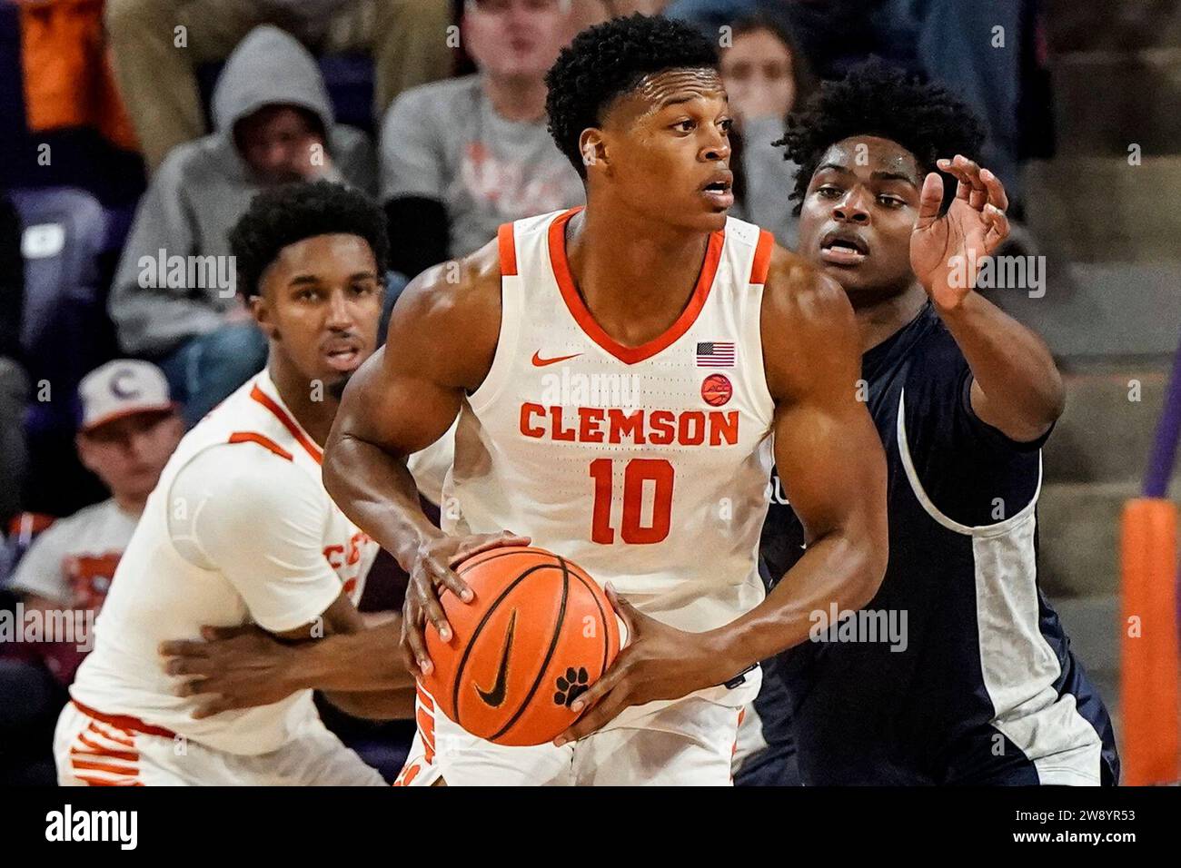 Clemson forward RJ Godfrey (10) works against Queens University of ...