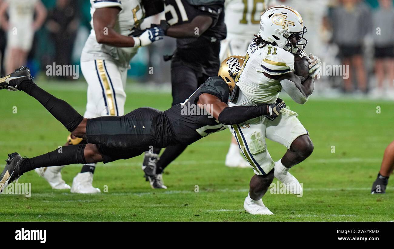 Georgia Tech running back Jamal Haynes (11) is stopped by Central ...