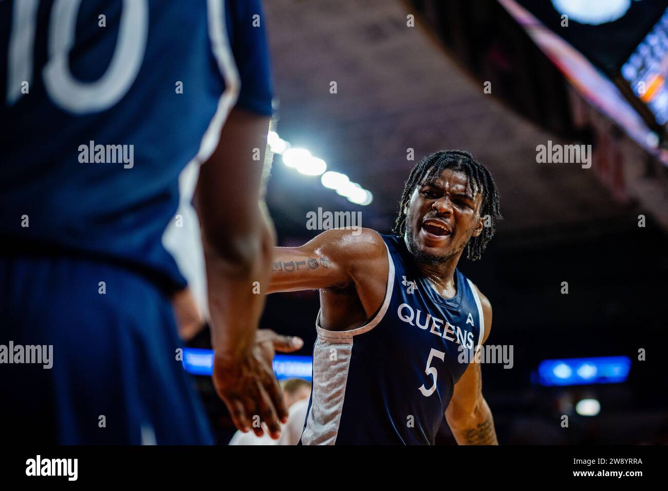 Clemson, SC, USA. 22nd Dec, 2023. Queens Royals AJ McKee (5) celebrates ...