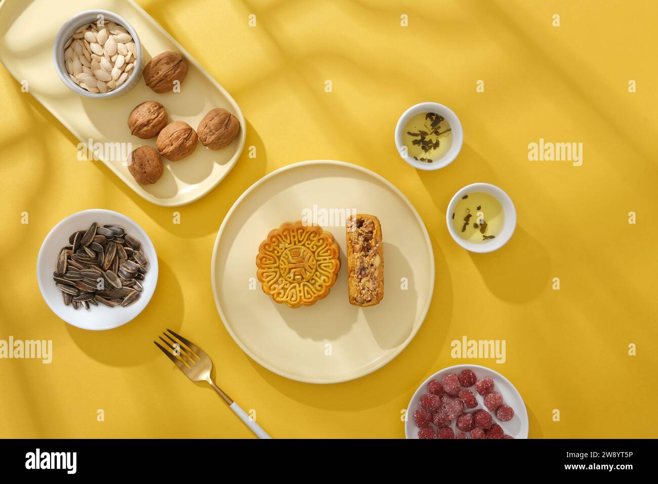 Scene for advertising mooncake on yellow background. Traditional foods ...