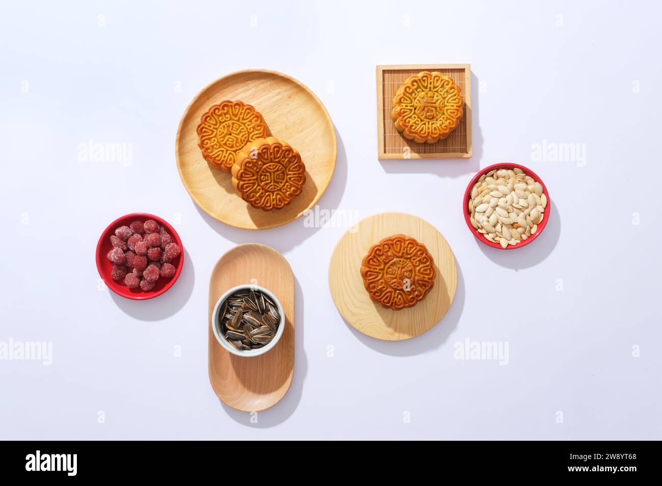 Minimal simplicity layout mooncakes, jam and seeds on white background ...