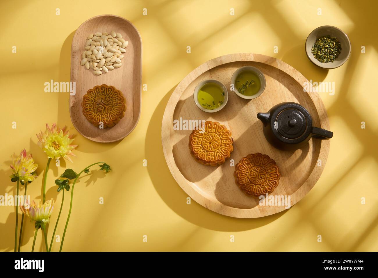 Concept of traditional festival chinese food on an Asian. On a yellow ...