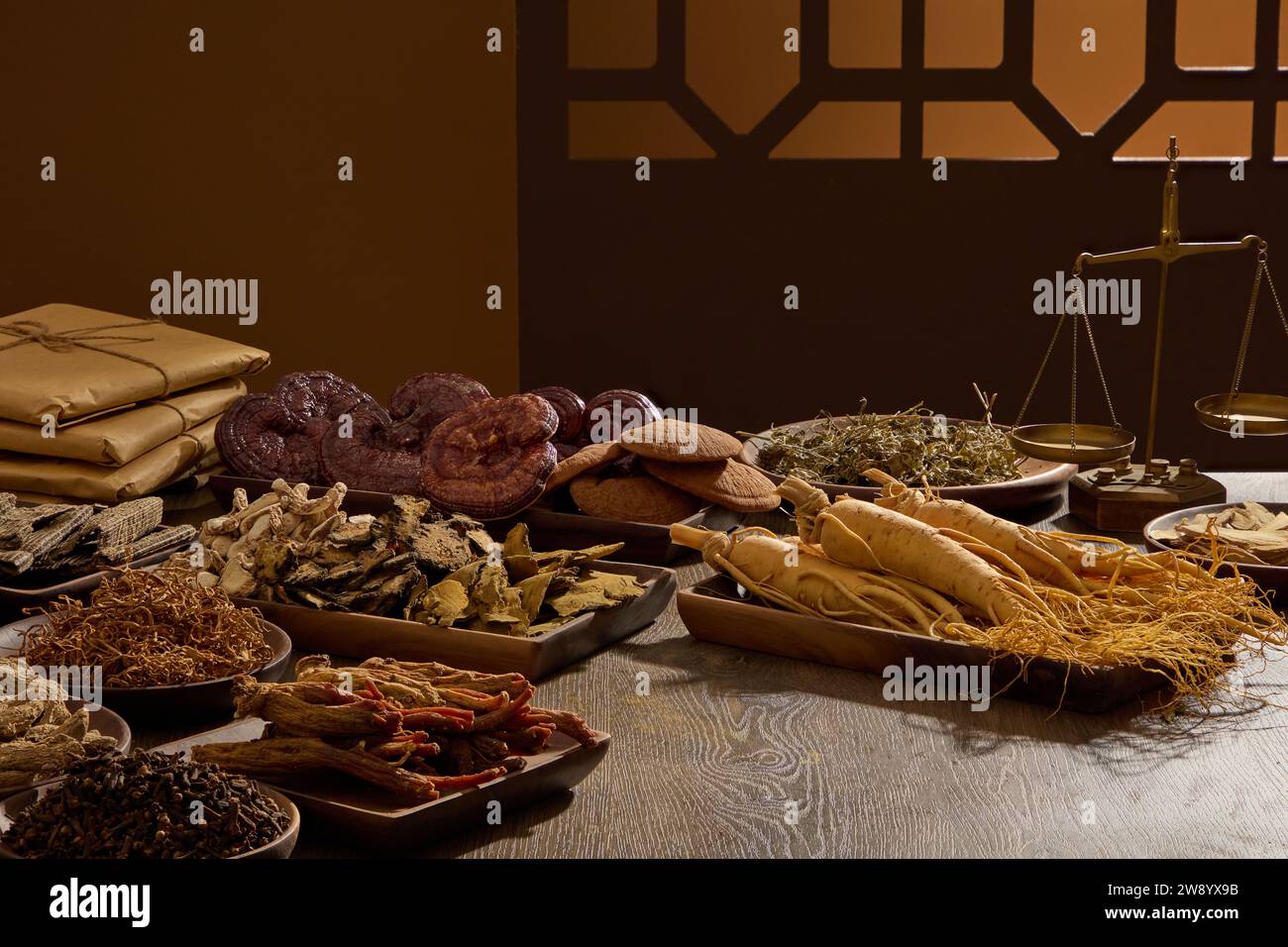 On the wooden table, different type of medicinal herbs displayed on ...