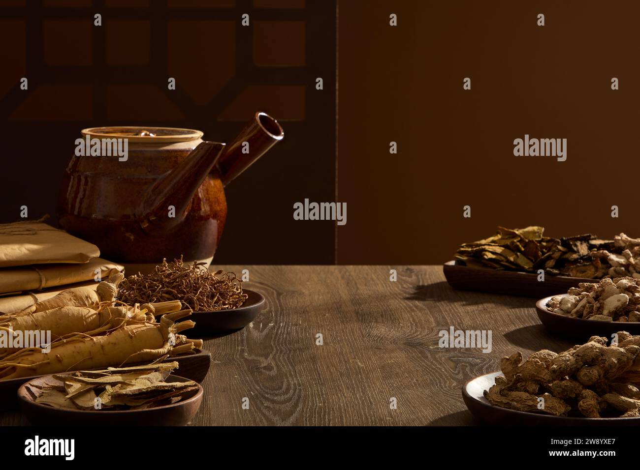 On the classic wooden table, small trays containing many different ...