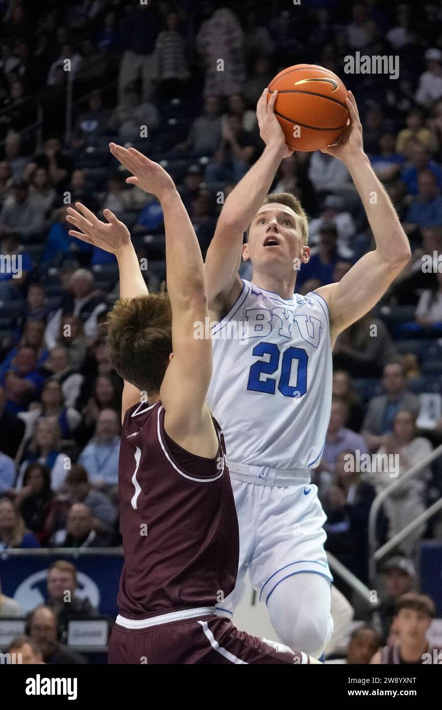 BYU guard Spencer Johnson (20) shoots as Bellarmine guard Landin Hacker ...