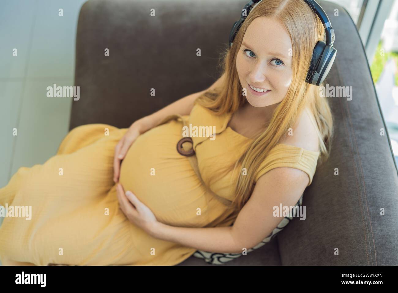 Expectant mom finds joy in her pregnancy, listening to soothing music ...