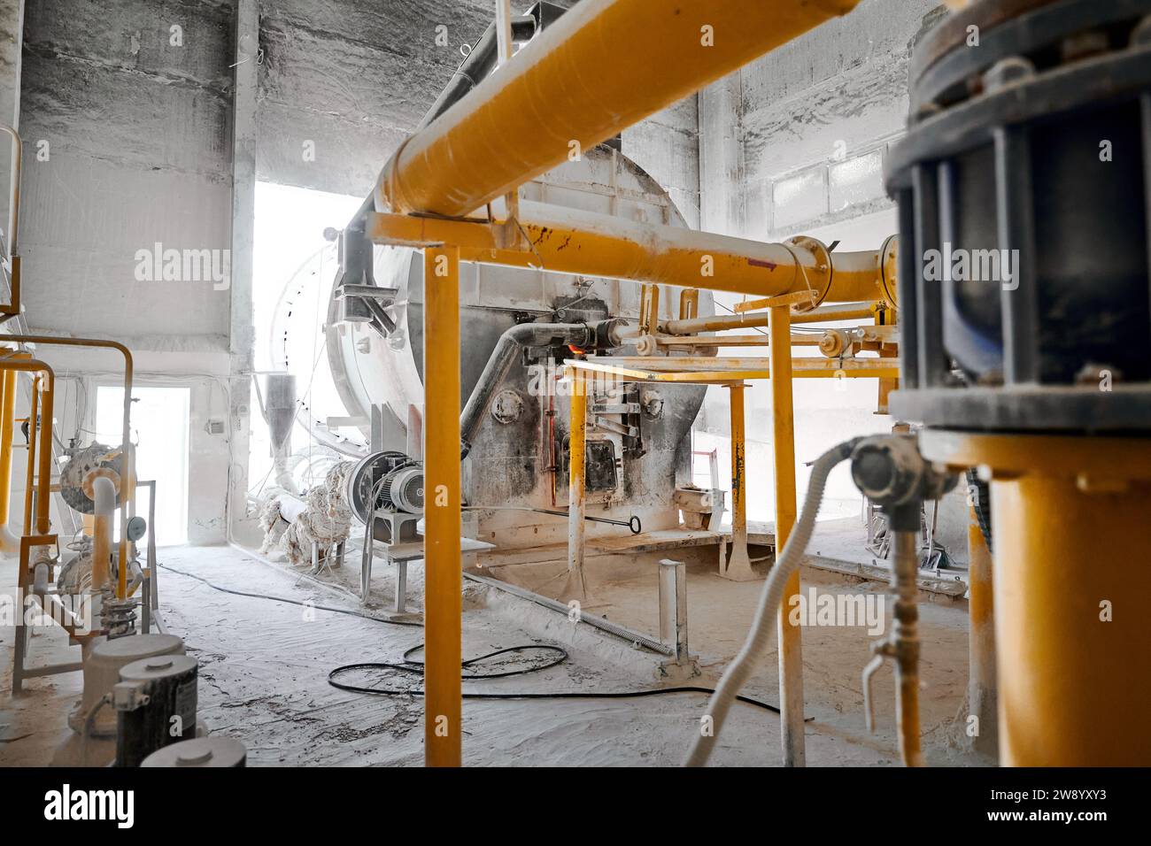 Fuel burning device of rotary kiln at manufacturing complex Stock Photo ...
