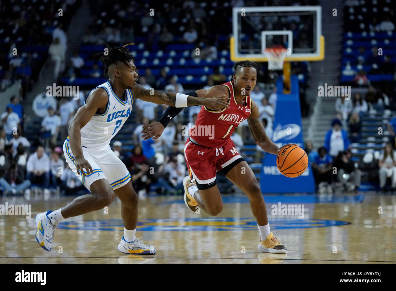 UCLA guard Dylan Andrews (2) defends against Maryland guard Jahmir ...