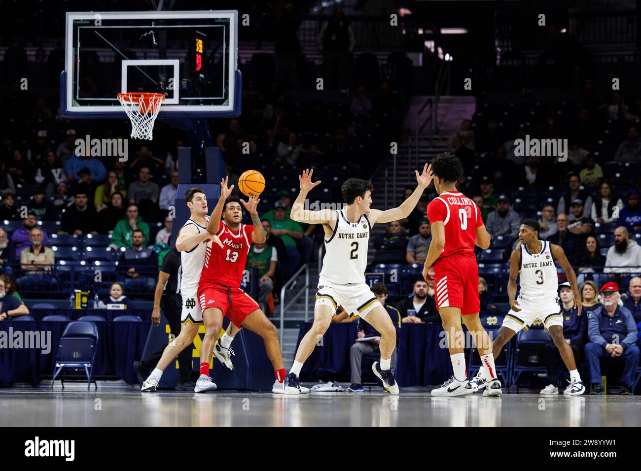 December 22, 2023: Marist center Max Allen II (13) receives the pass as ...