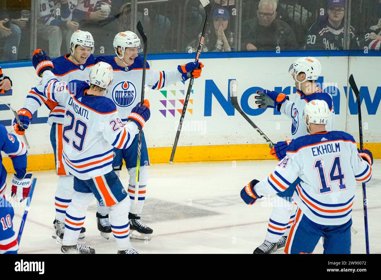 Edmonton Oilers players celebrate after a goal scored by center Ryan ...