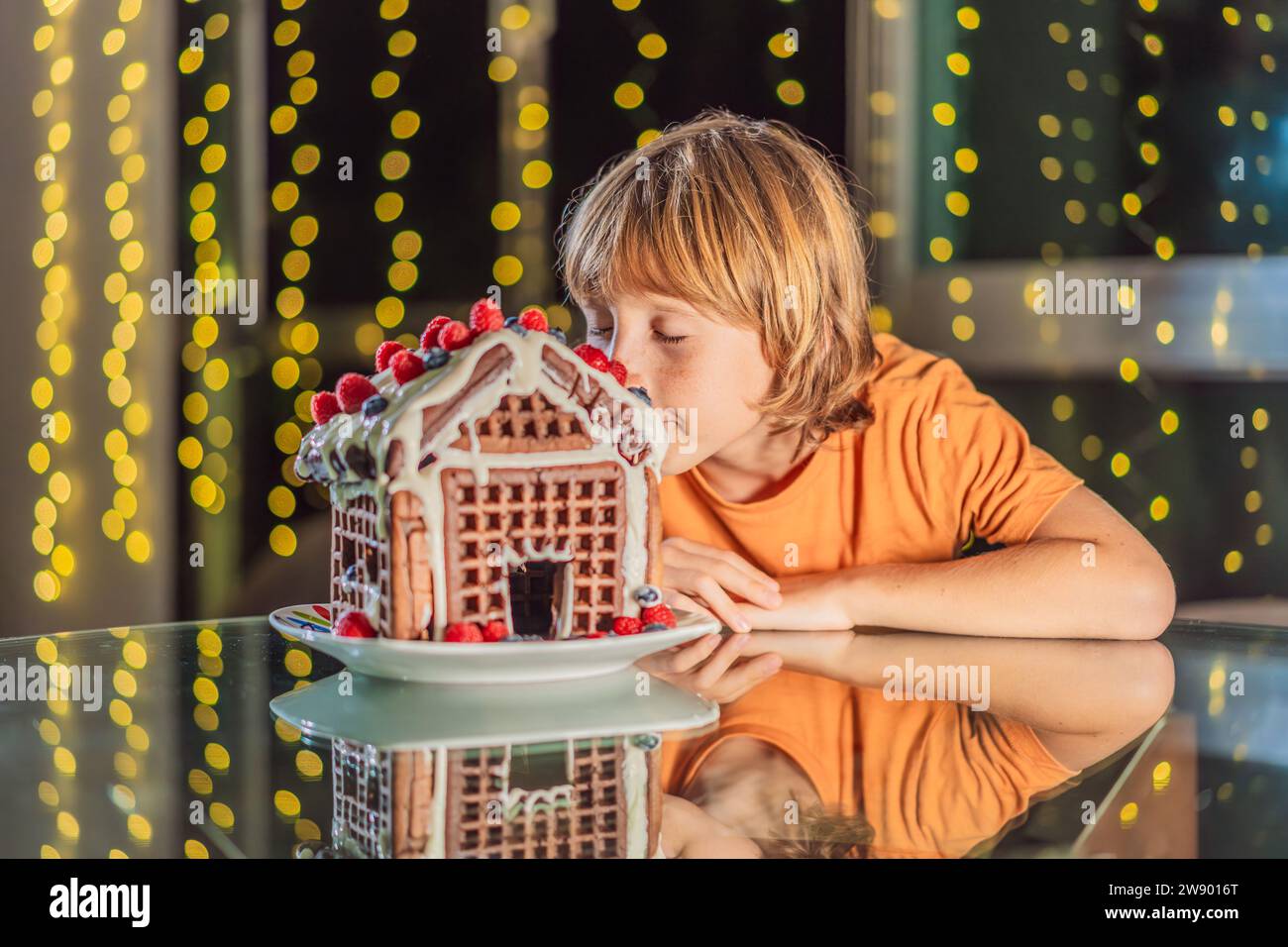 Immerse in festive delight as a boy crafts boy crafting an ...
