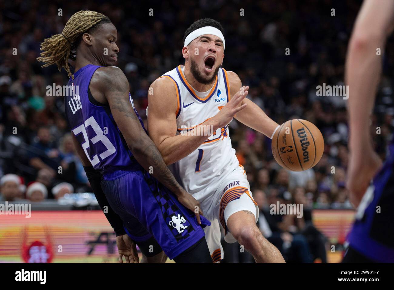 Sacramento Kings guard Keon Ellis (23) defends againbst Phoenix Suns ...