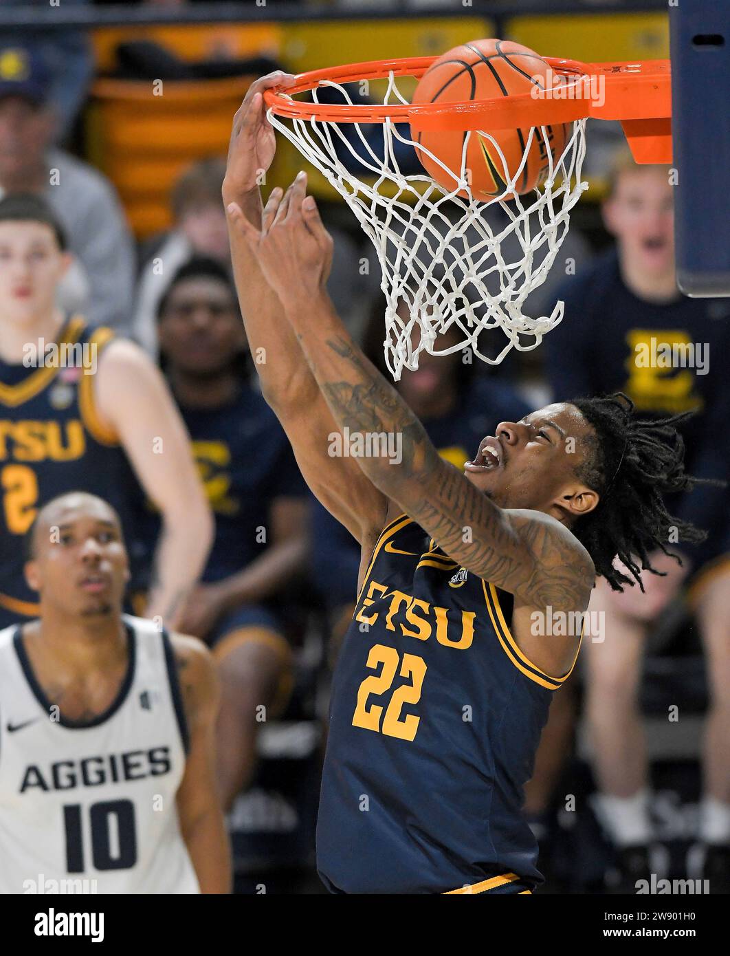 East Tennessee State forward Jaden Seymour (22) dunks as Utah State ...