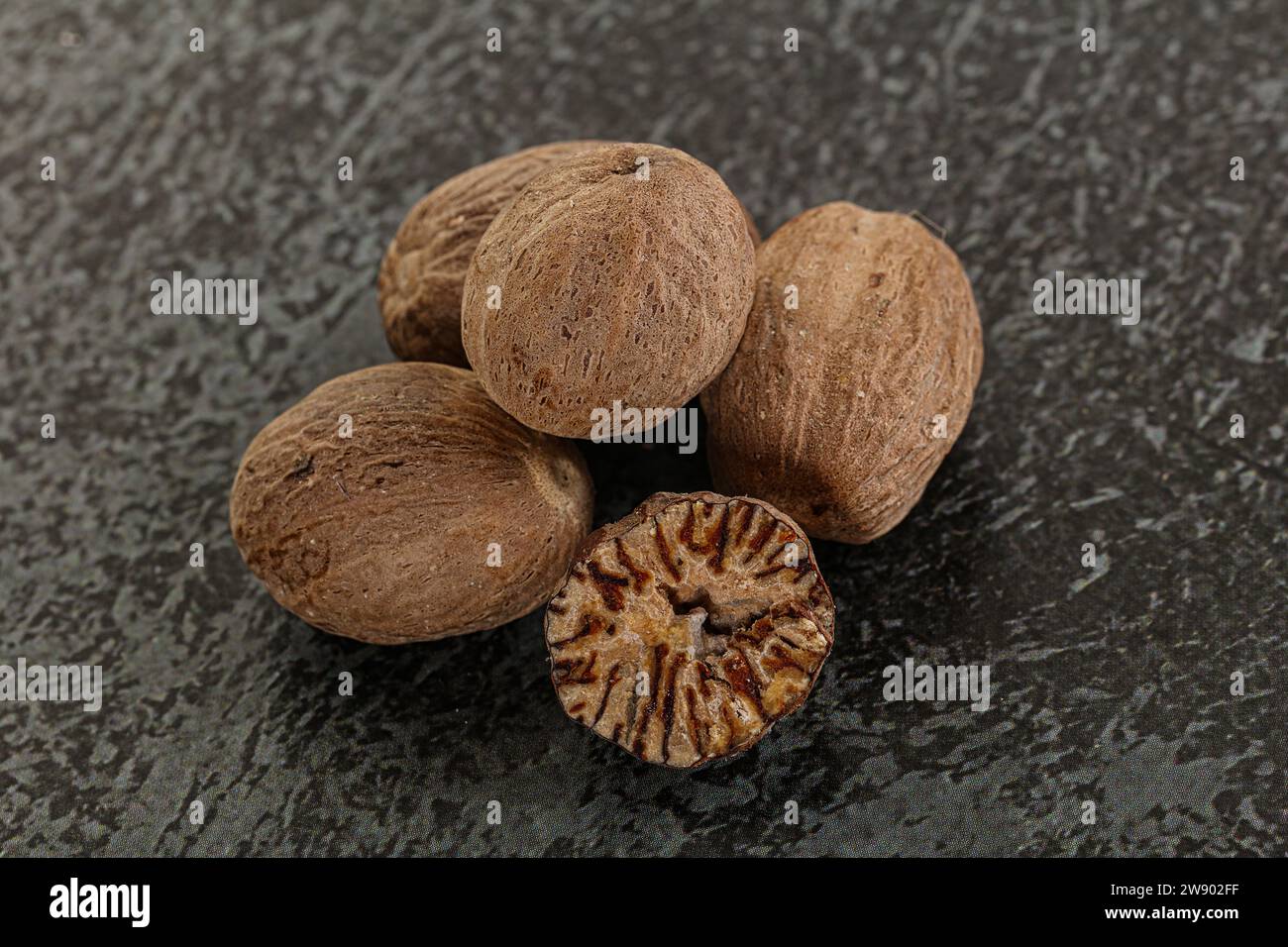 Aroma seasoning Nutmeg for cooking and bakery Stock Photo - Alamy