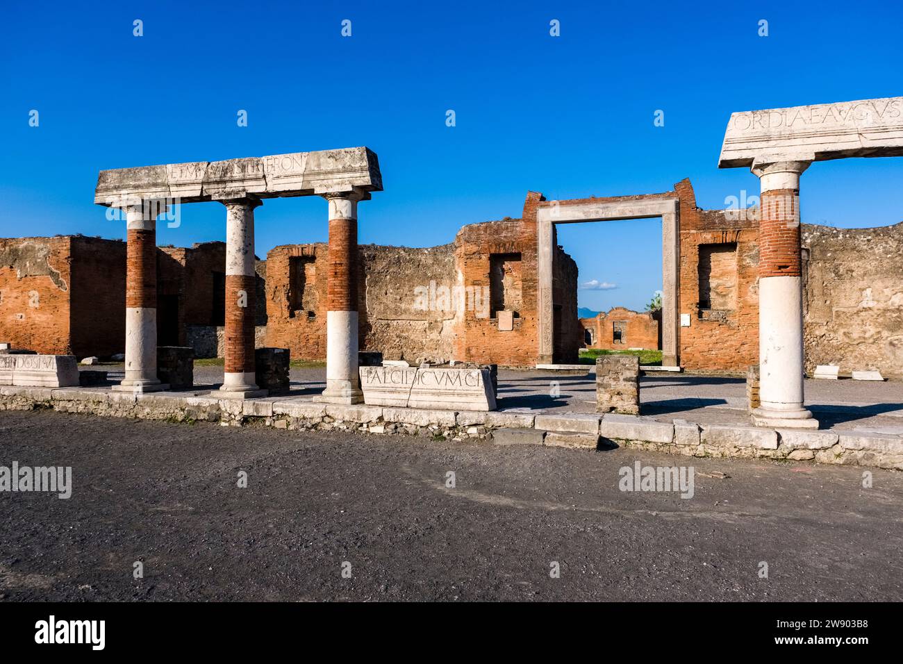 Ruins of the Forum in the archaeological site of Pompeii, an ancient ...