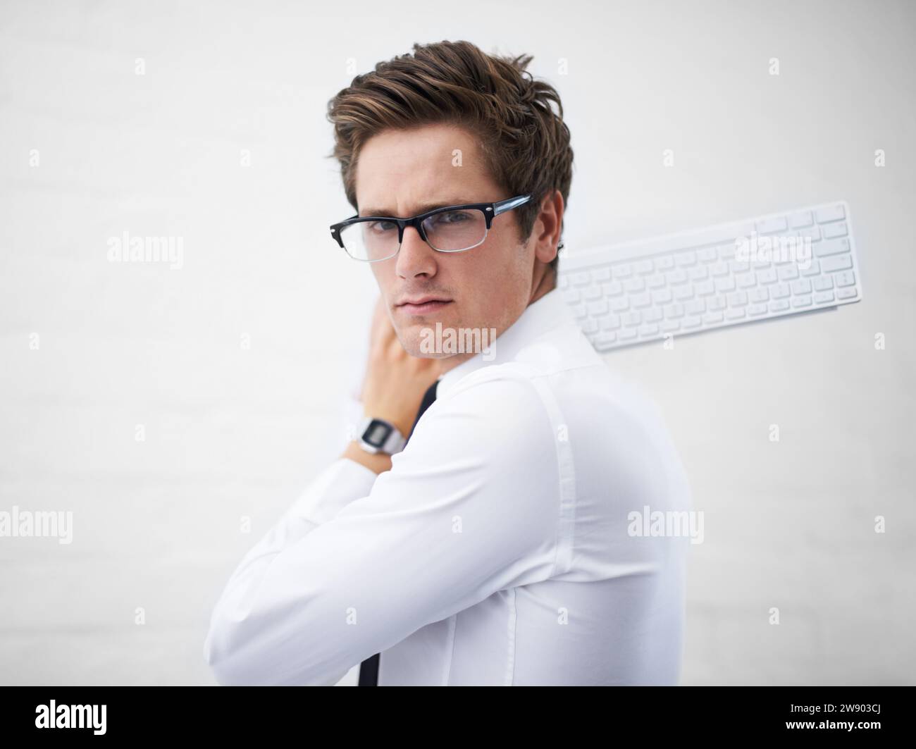 Man, angry and hitting with keyboard, boss and portrait to employee for ...