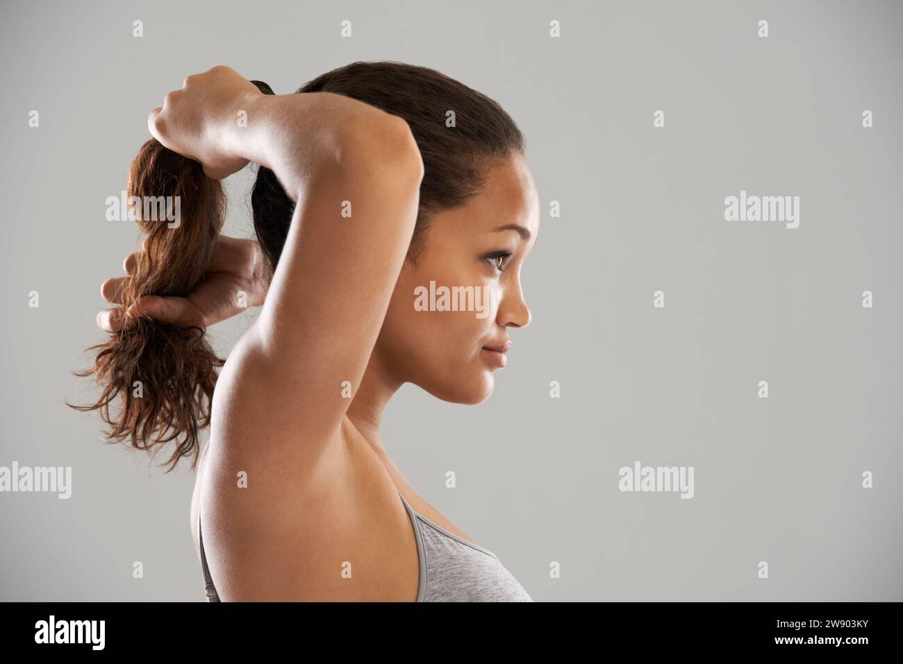 Fitness, tie hair or profile of model isolated on grey background for ...