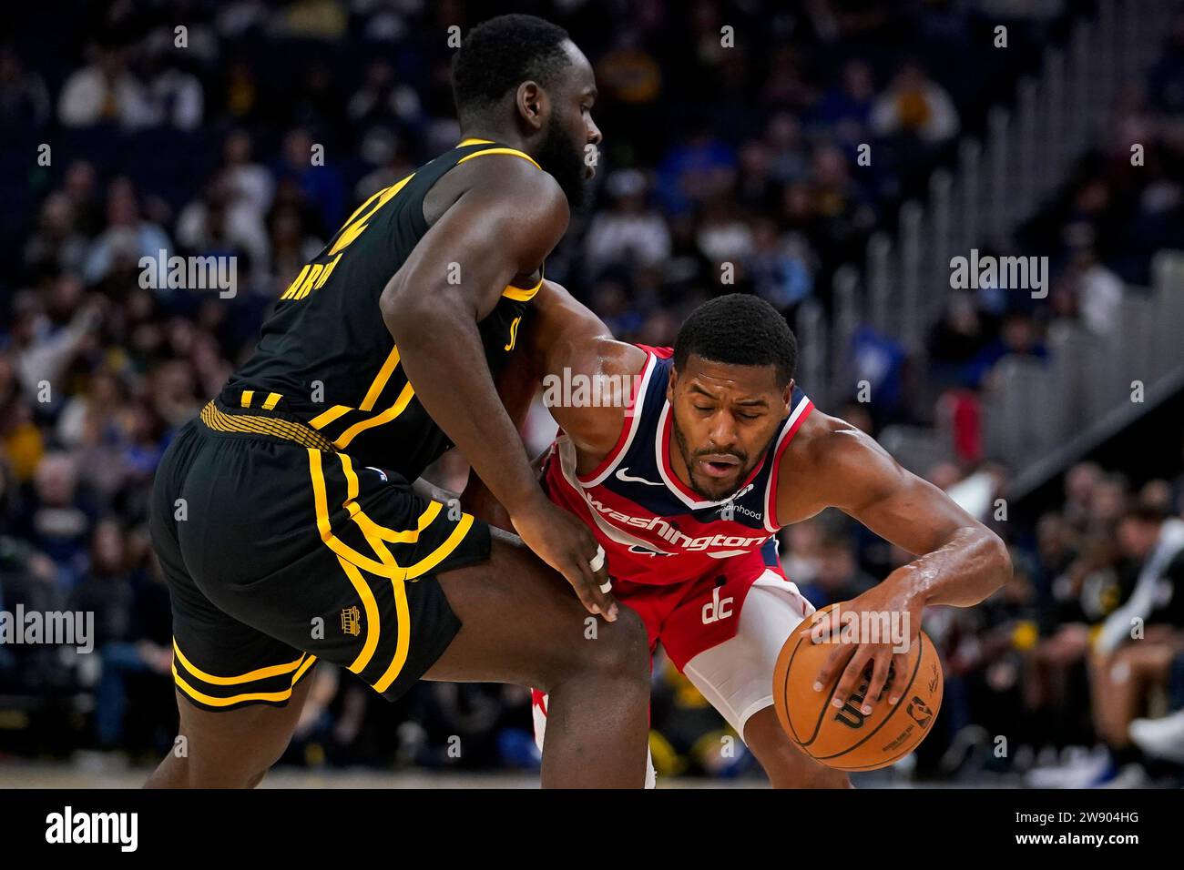 Washington Wizards guard Jared Butler, right, tries to get around ...