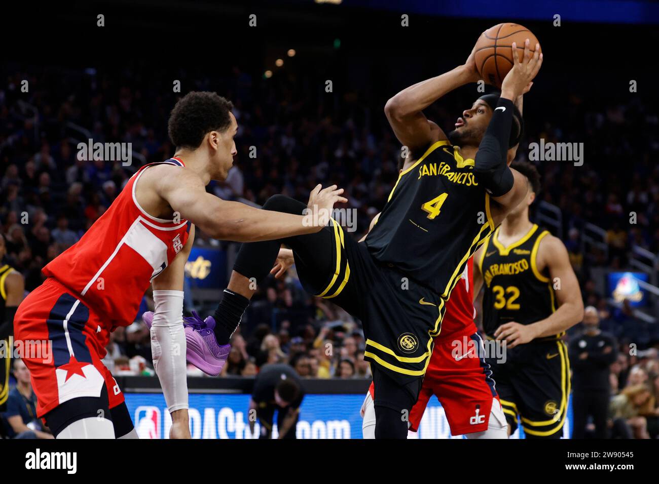 Golden State Warriors guard Moses Moody (4) shoots after he was fouled by Washington Wizards ...