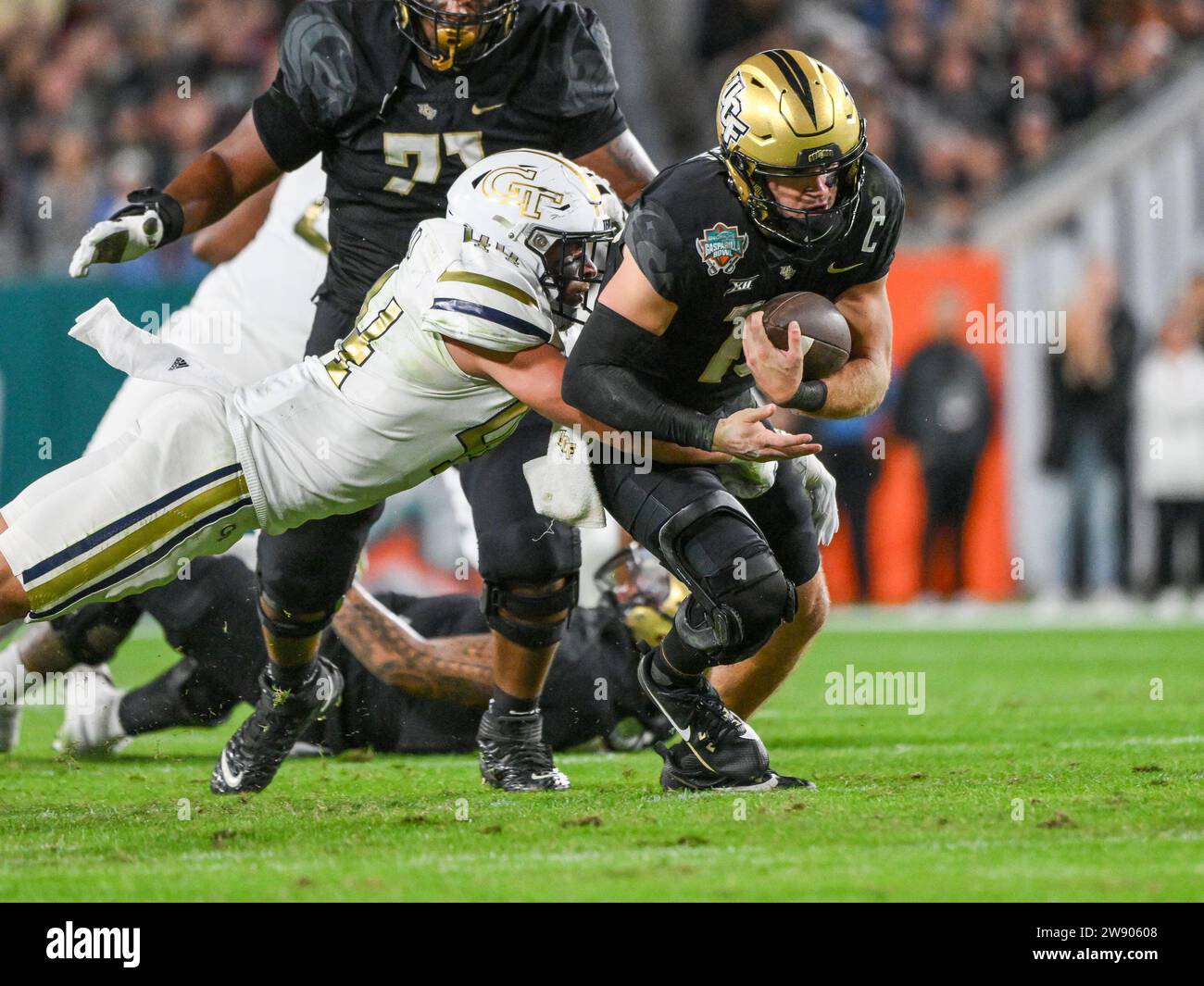 Tampa, FL, USA. 22nd Dec, 2023. UCF quarterback John Rhys Plumlee (10 ...