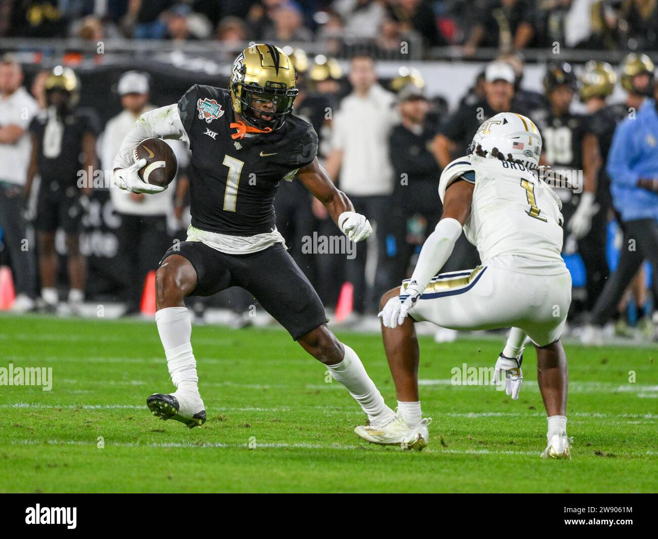 Tampa, FL, USA. 22nd Dec, 2023. UCF wide receiver Javon Baker (1) looks ...