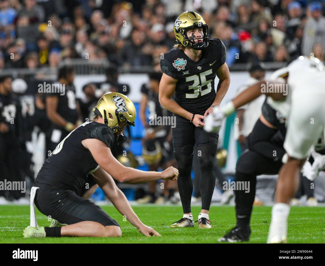 Tampa, FL, USA. 22nd Dec, 2023. UCF place kicker Colton Boomer (35 ...